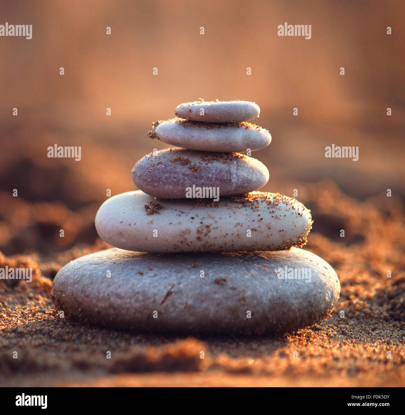 Stack of pebbles on the beach Stock Photo - Alamy