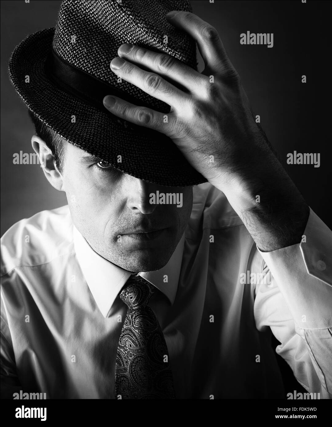 Hand man holding camera Black and White Stock Photos & Images - Alamy