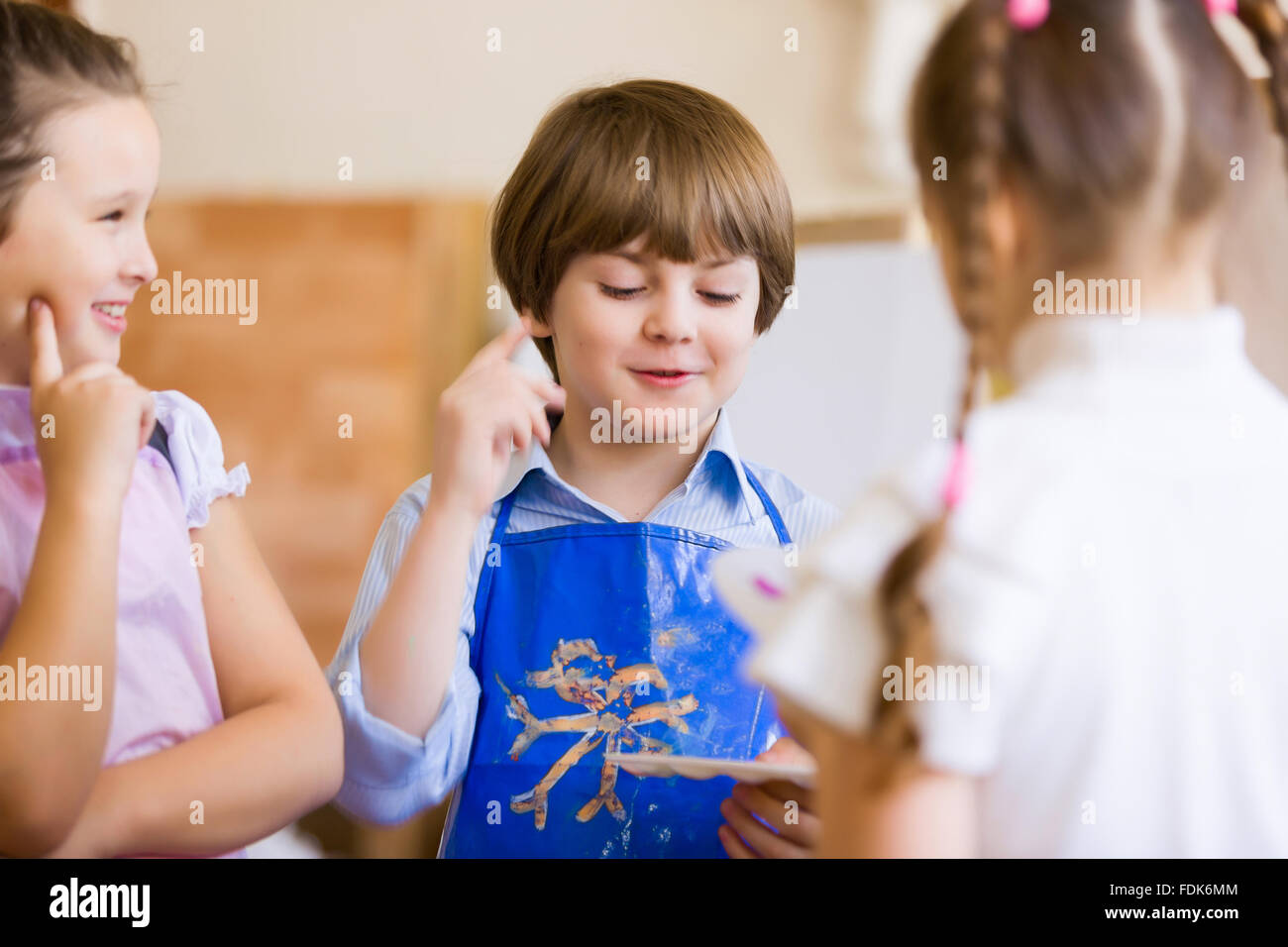 Little children painting and playing at kindergarten Stock Photo - Alamy