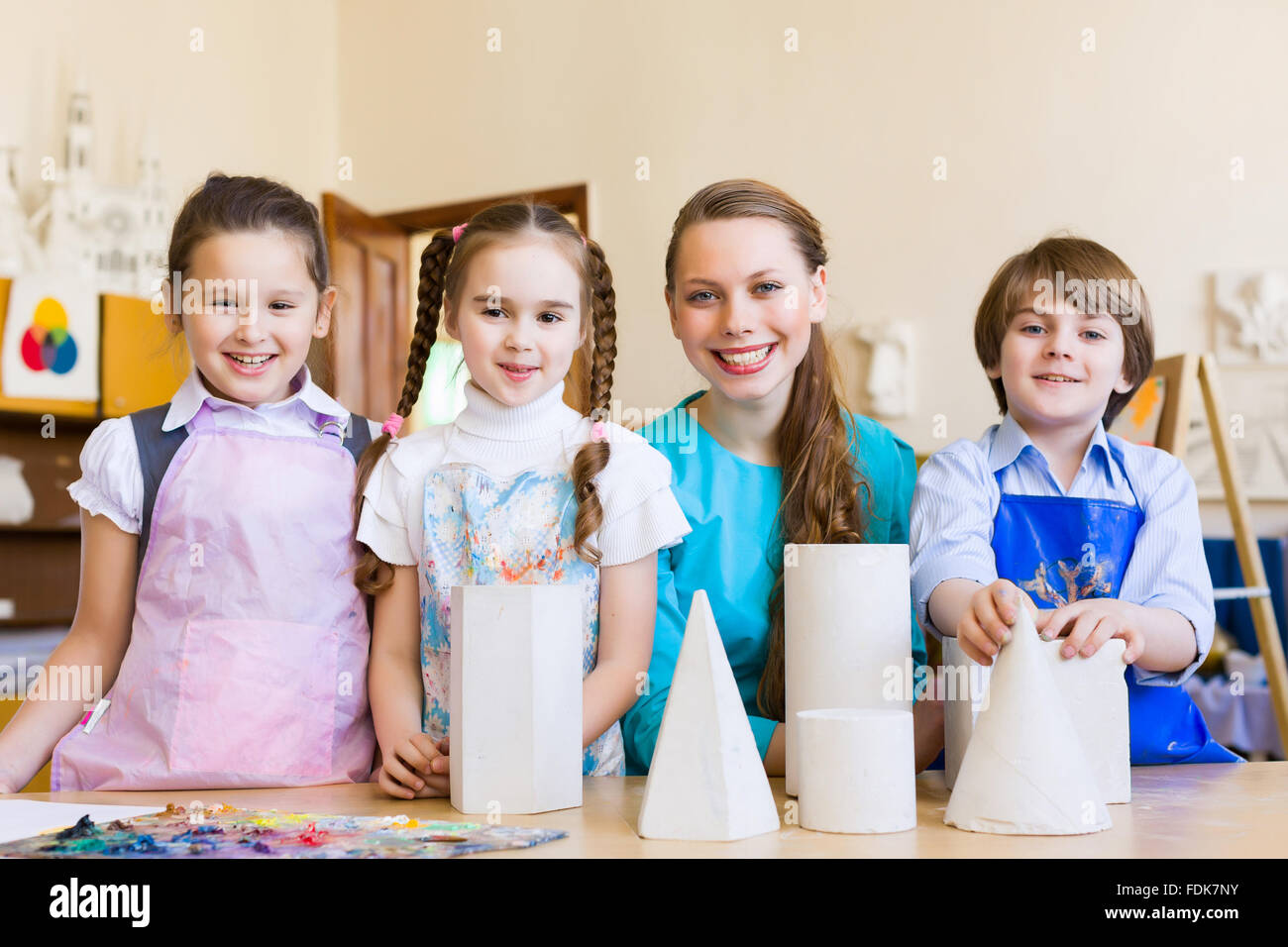 Little children painting and playing at kindergarten Stock Photo - Alamy
