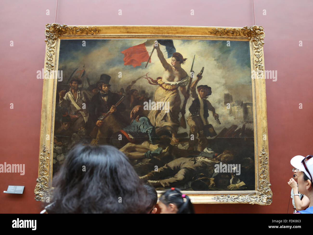 Tourist inside Louvre Museum. Liberty leading the people, 1831. By ...