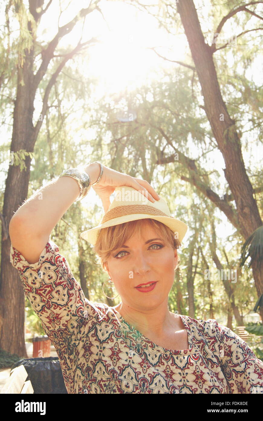 Putting On Hat High Resolution Stock Photography and Images - Alamy