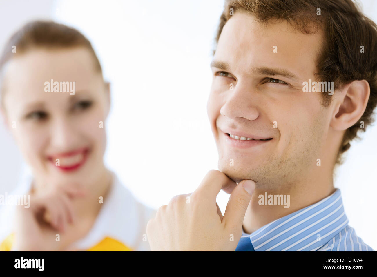 Image of businessman and businesswoman smiling joyfully Stock Photo - Alamy