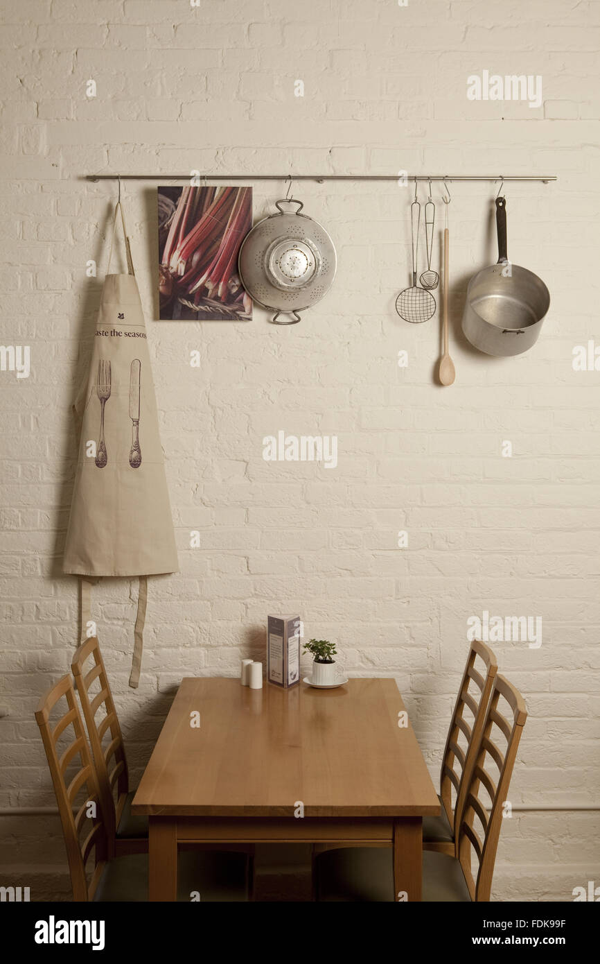 Old kitchen utensils used as display at Polesden Lacey restaurant ...