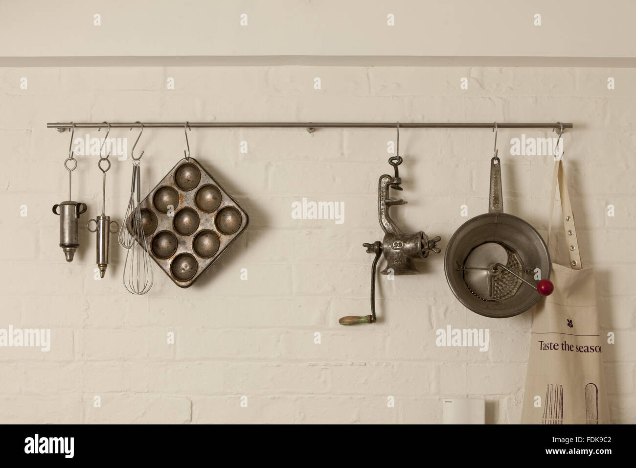 Kitchen utensils on display at Polesden Lacey restaurant, Surrey Stock ...