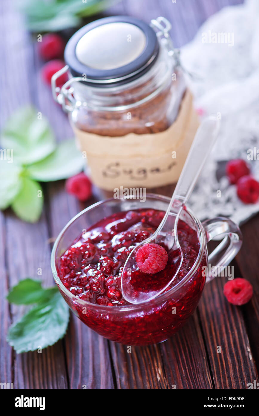 raspberry jam in glass cup and on a table Stock Photo - Alamy