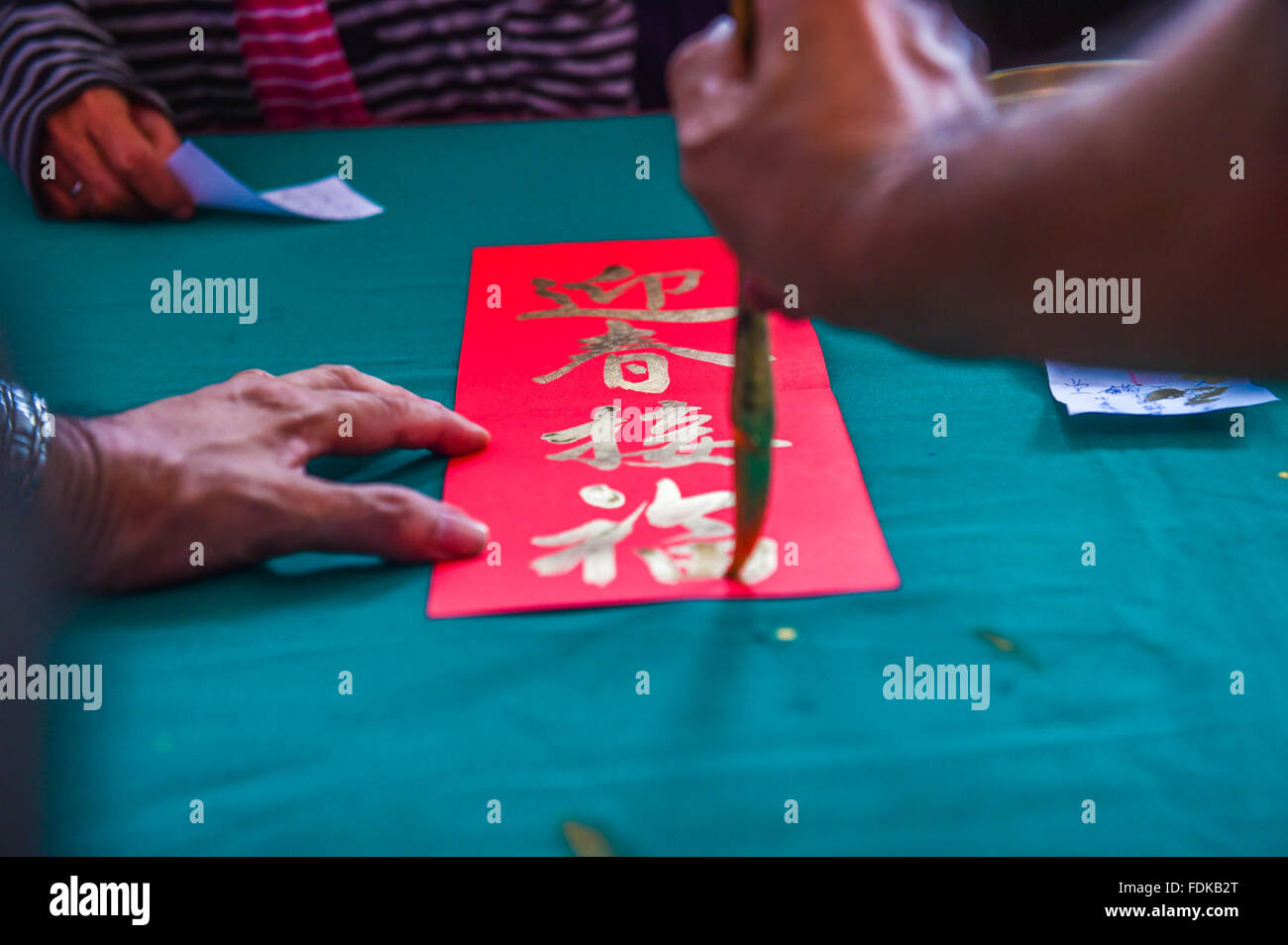 Ho Chi Minh City, Vietnam. 1st Feb, 2016. A calligrapher writes new ...