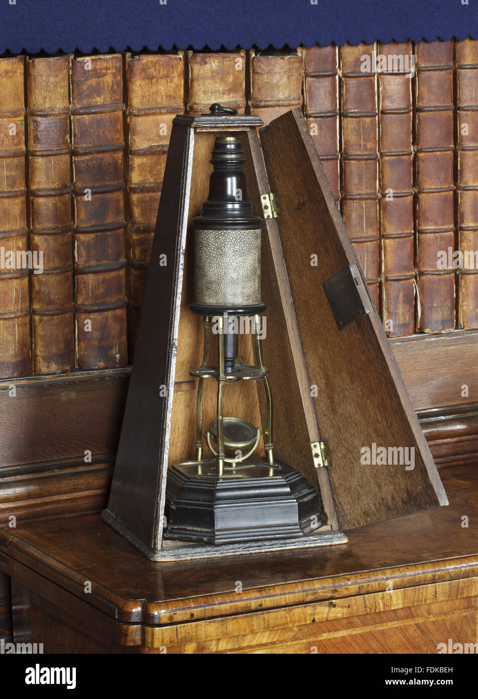 Victorian microscope in ebony and brass with x4 lens, on an ebonised ...