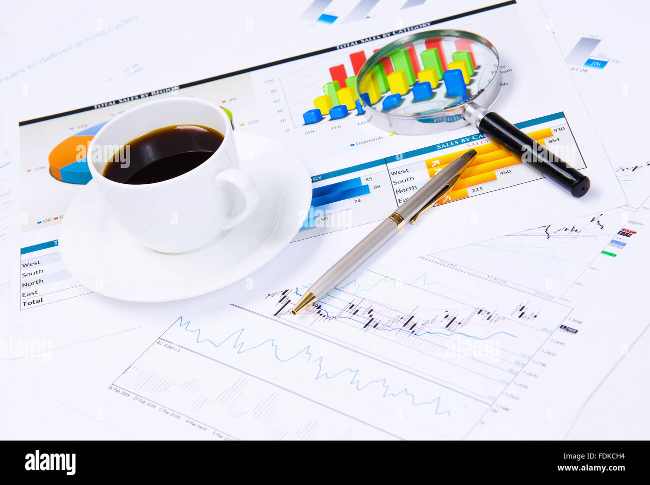 Close up image of office workplace with cup of coffee and documents ...