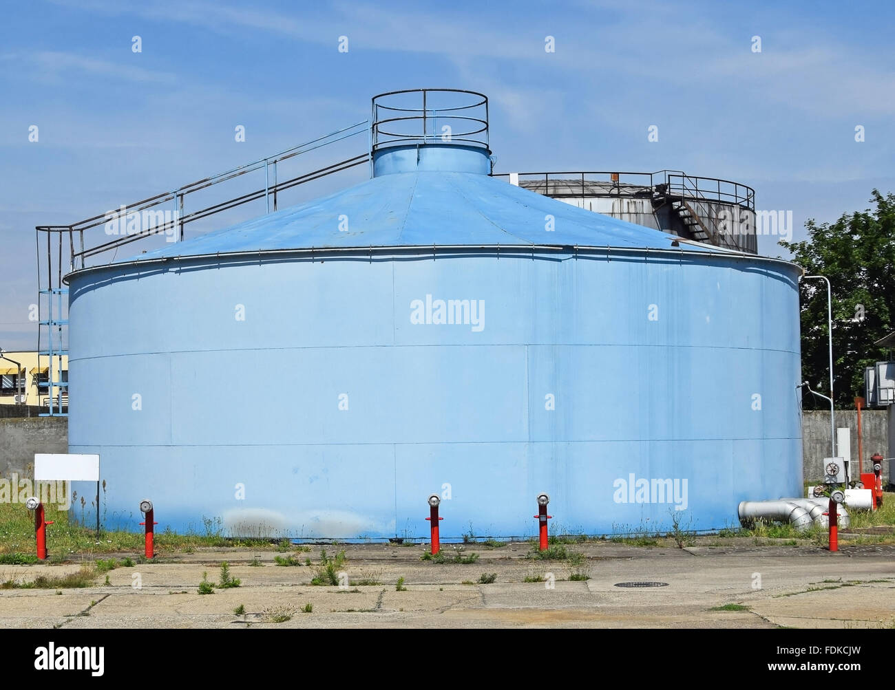 Gas container of the power station Stock Photo - Alamy