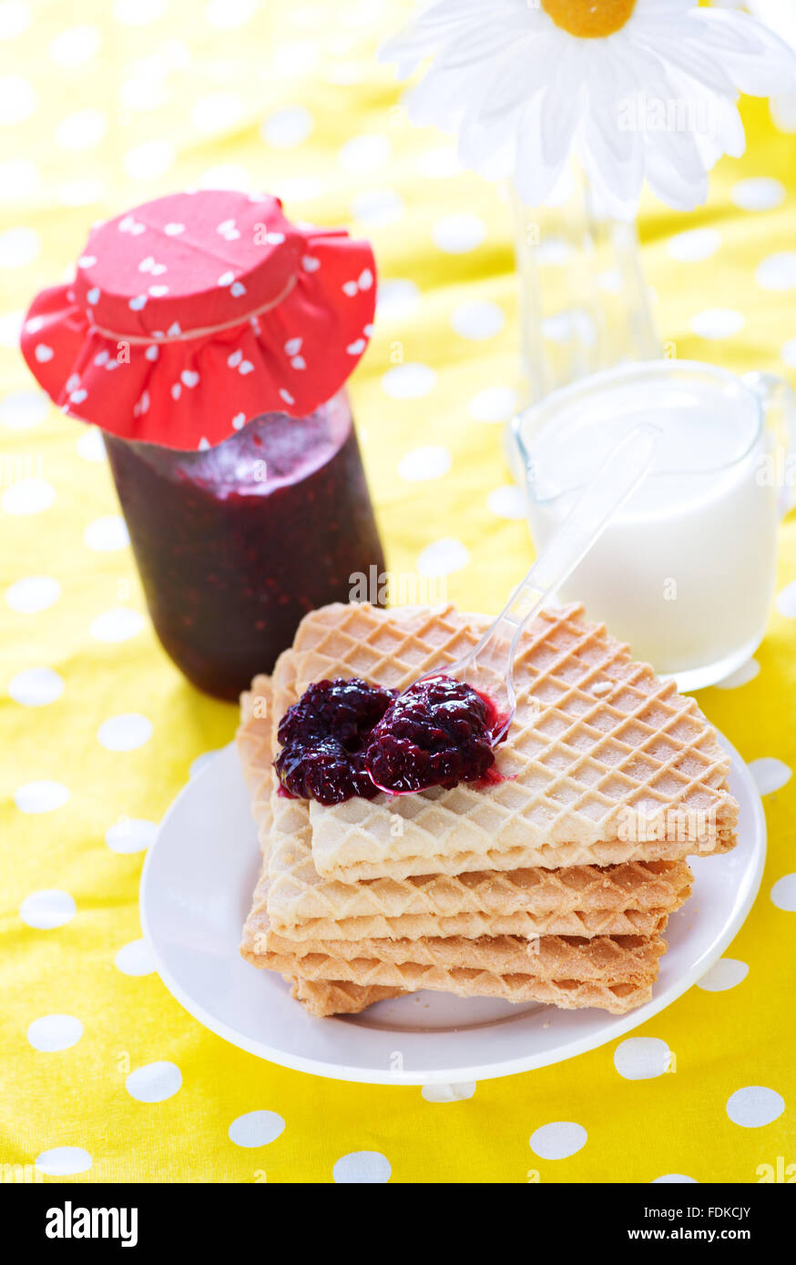 waffles on plate and on a table Stock Photo - Alamy