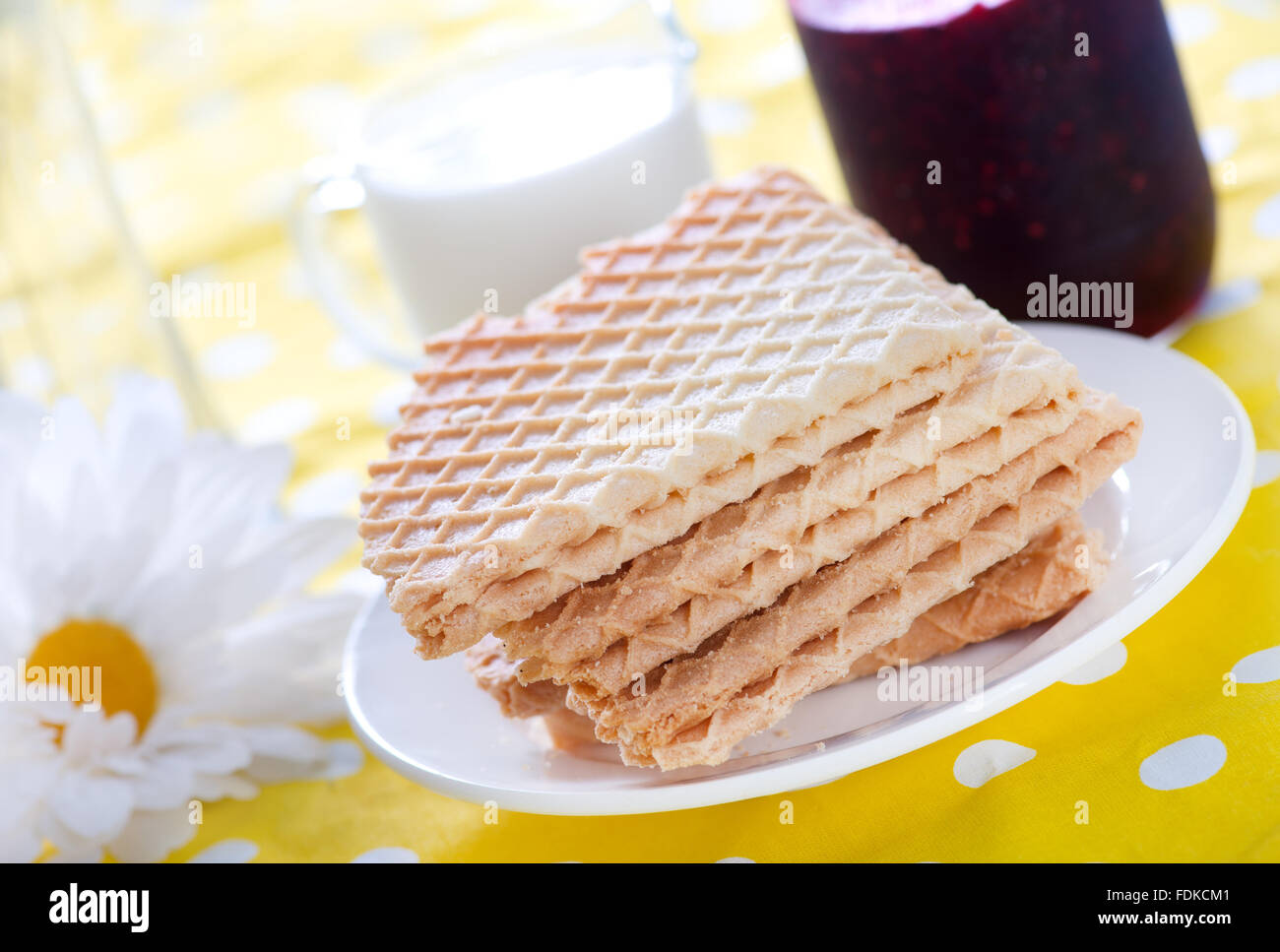 waffles on plate and on a table Stock Photo - Alamy