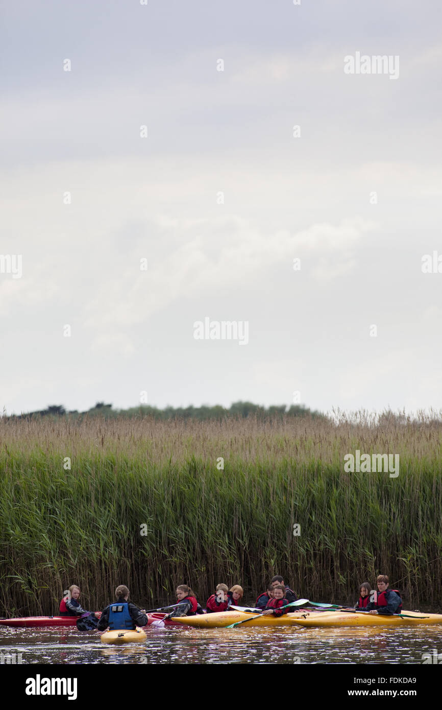 Children kayaking at Brancaster, Norfolk Stock Photo - Alamy