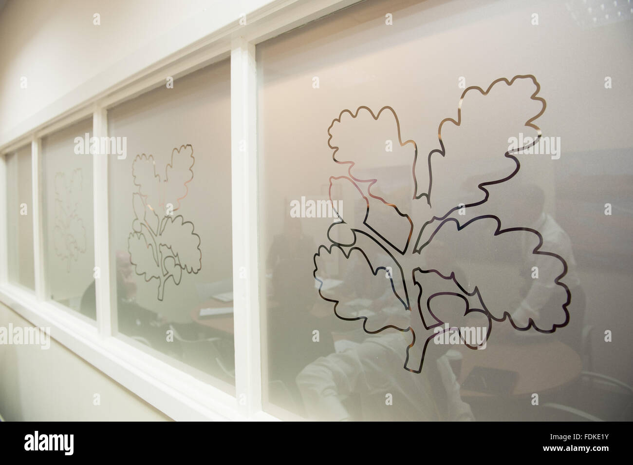 The logo on a glass panel at the National Trust Membership Department ...