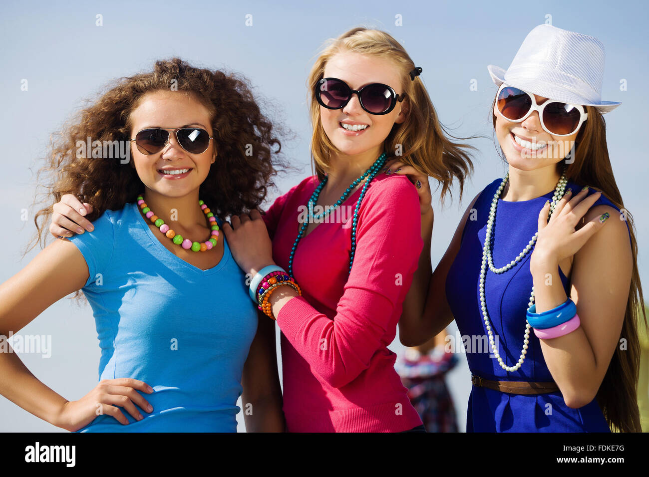 Attractive young women having fun outdoors. Summer vacation Stock Photo ...