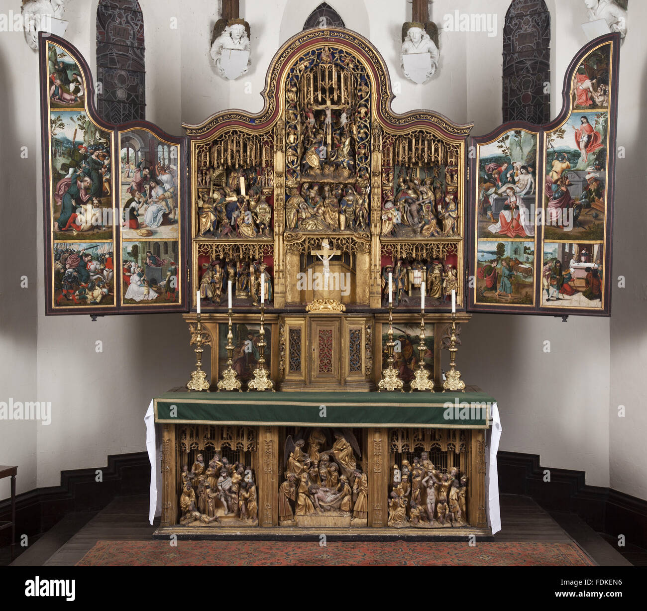 Flemish sixteenth-century composite altarpiece in the Chapel at Oxburgh Hall, Norfolk. The ...