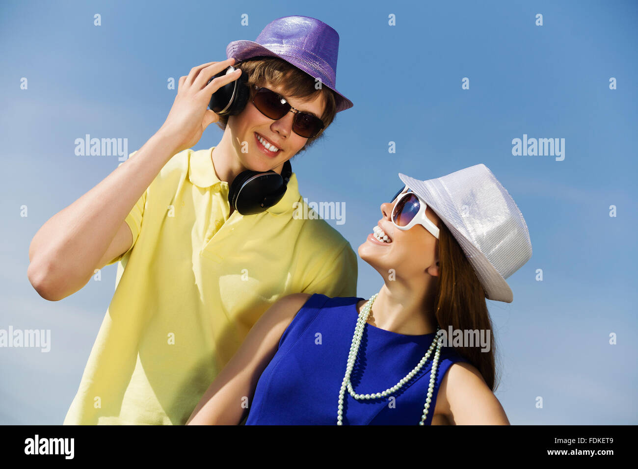 Young man and young woman outdoors. Summer vacation Stock Photo - Alamy