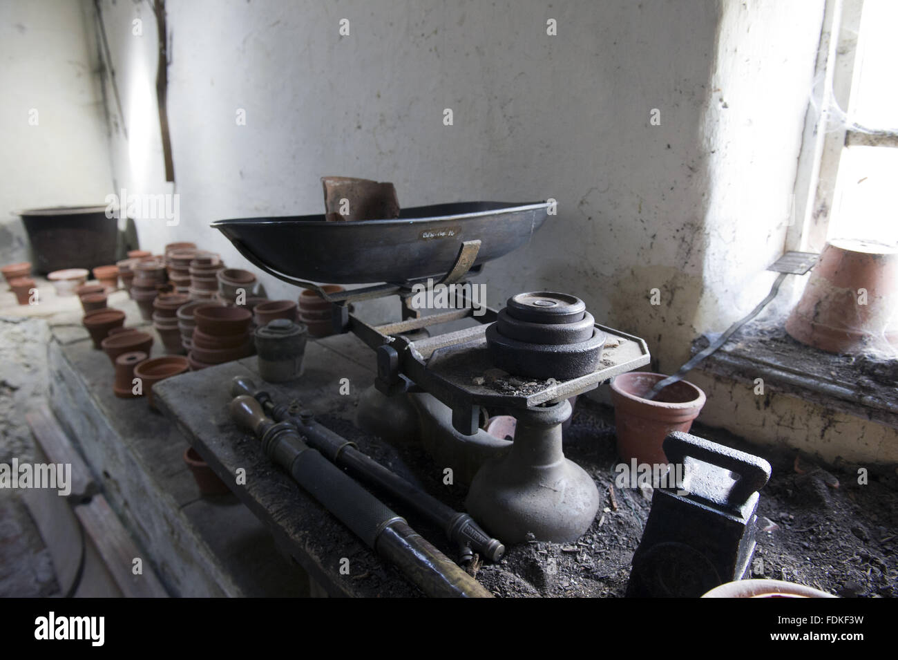 Terracotta pots and weighing scales at Beningbrough Hall, North ...