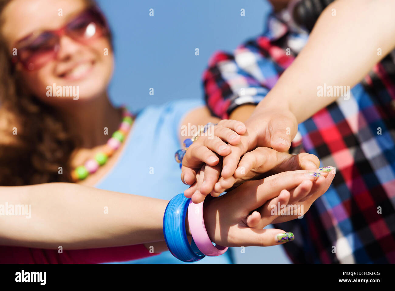 Group of young happy people. Unity concept Stock Photo - Alamy