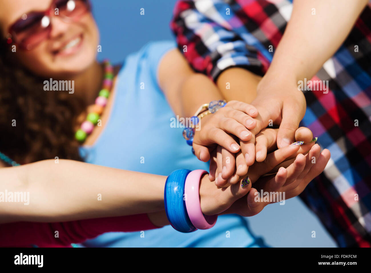 Group of young happy people. Unity concept Stock Photo - Alamy