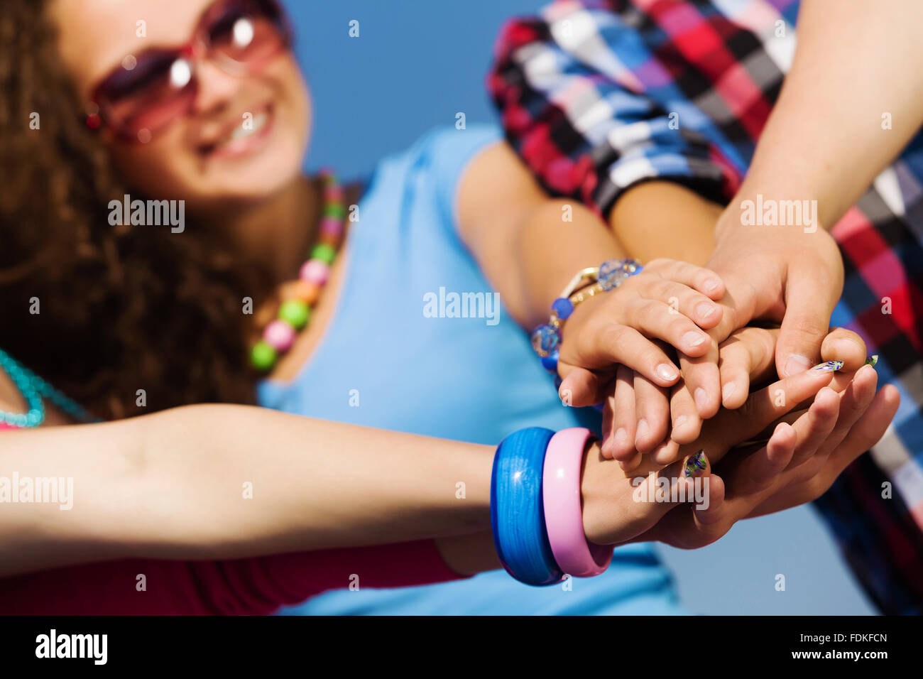 Group of young happy people. Unity concept Stock Photo - Alamy