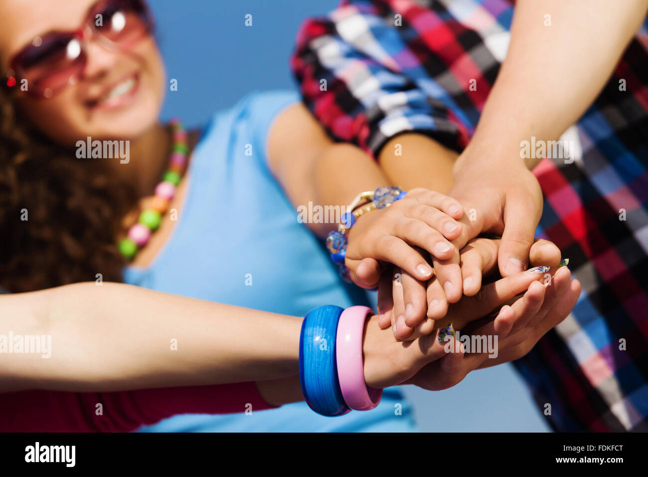 Group of young happy people. Unity concept Stock Photo - Alamy