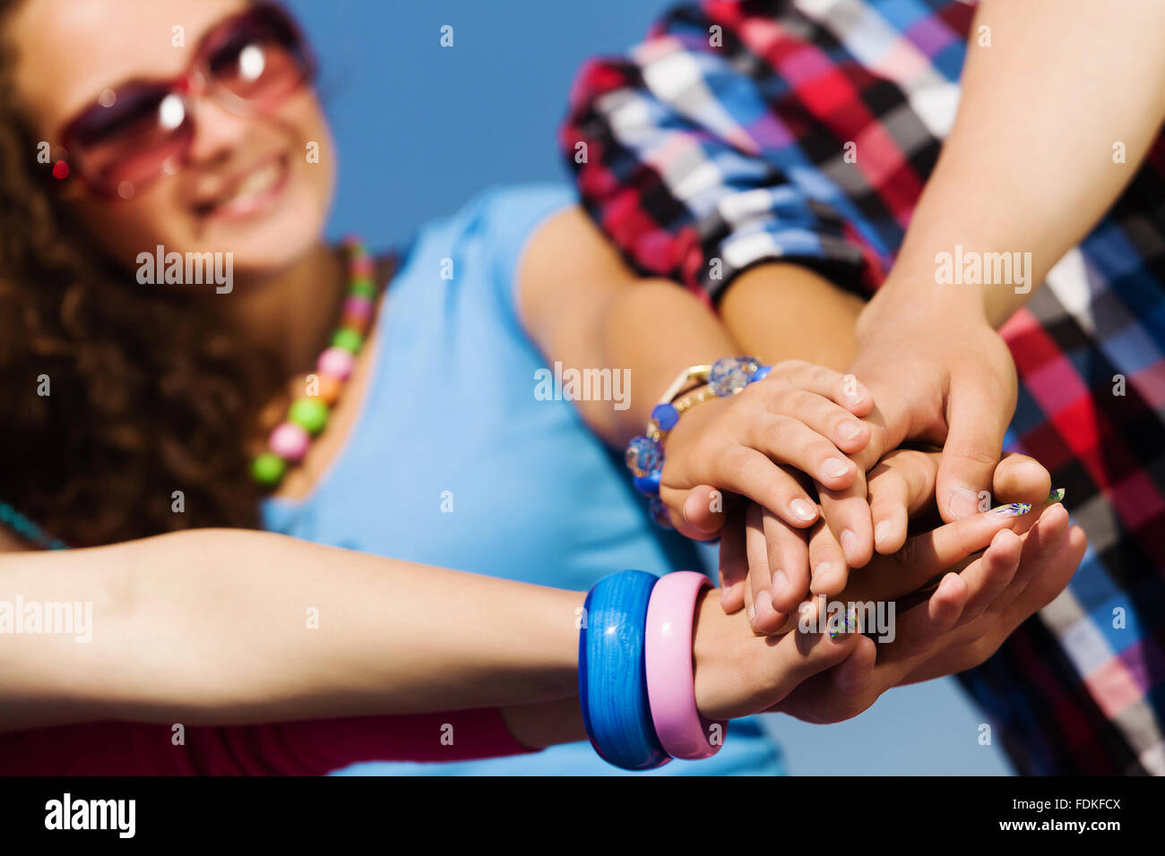 Group of young happy people. Unity concept Stock Photo - Alamy