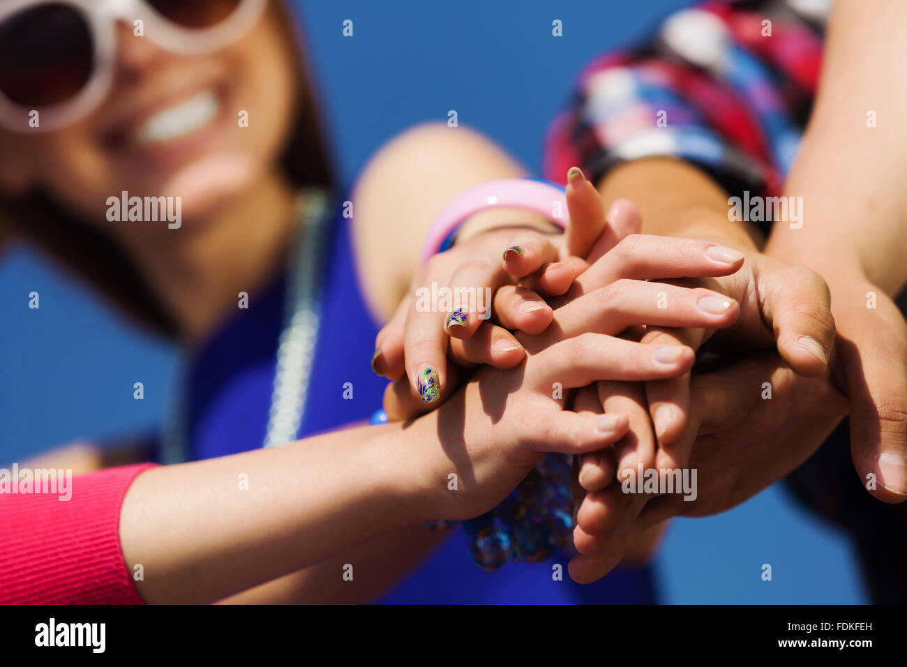 Group of young happy people. Unity concept Stock Photo - Alamy