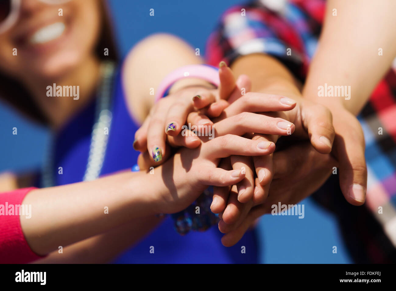 Group of young happy people. Unity concept Stock Photo - Alamy
