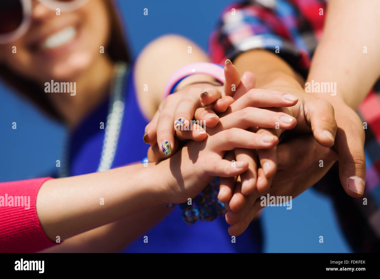 Group of young happy people. Unity concept Stock Photo - Alamy
