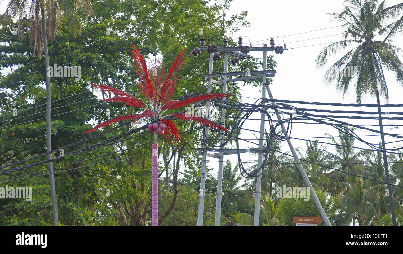 Artificial coconut tree amongst electric cables Stock Photo - Alamy