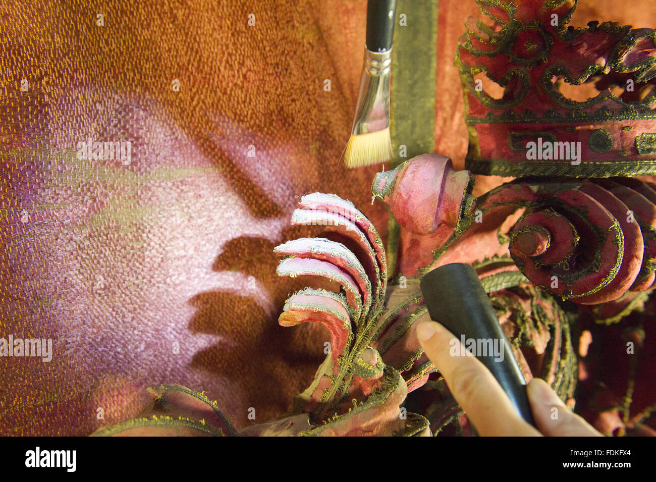 A Conservator working on the canopy in the Long Gallery at Hardwick ...