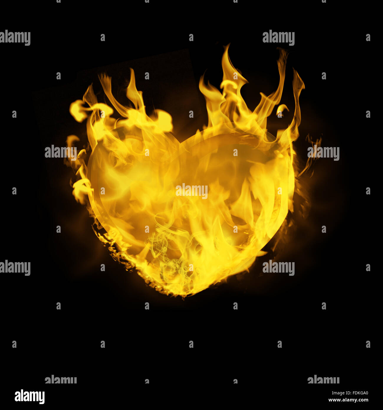 Composite image of heart in fire Stock Photo - Alamy