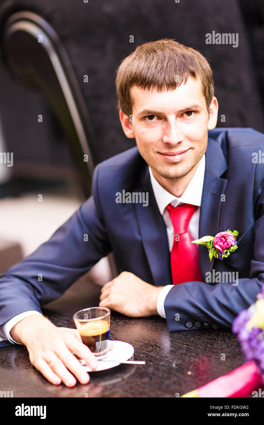 groom drinking coffee Stock Photo - Alamy