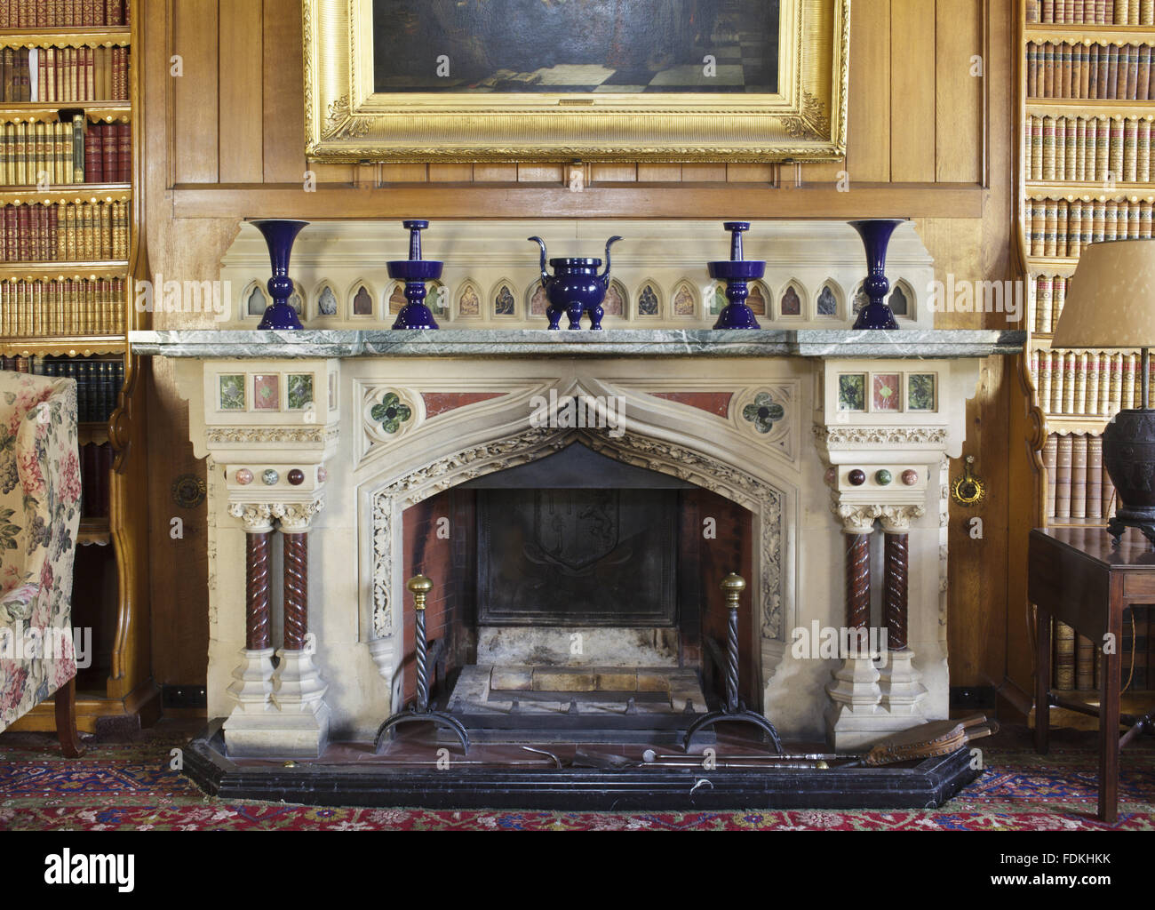 The fireplace in the Library at Tyntesfield, North Somerset Stock Photo ...