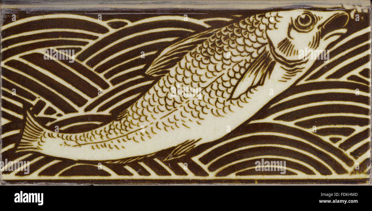 Decorative tile with brown and white fish motif above the bath in the ...