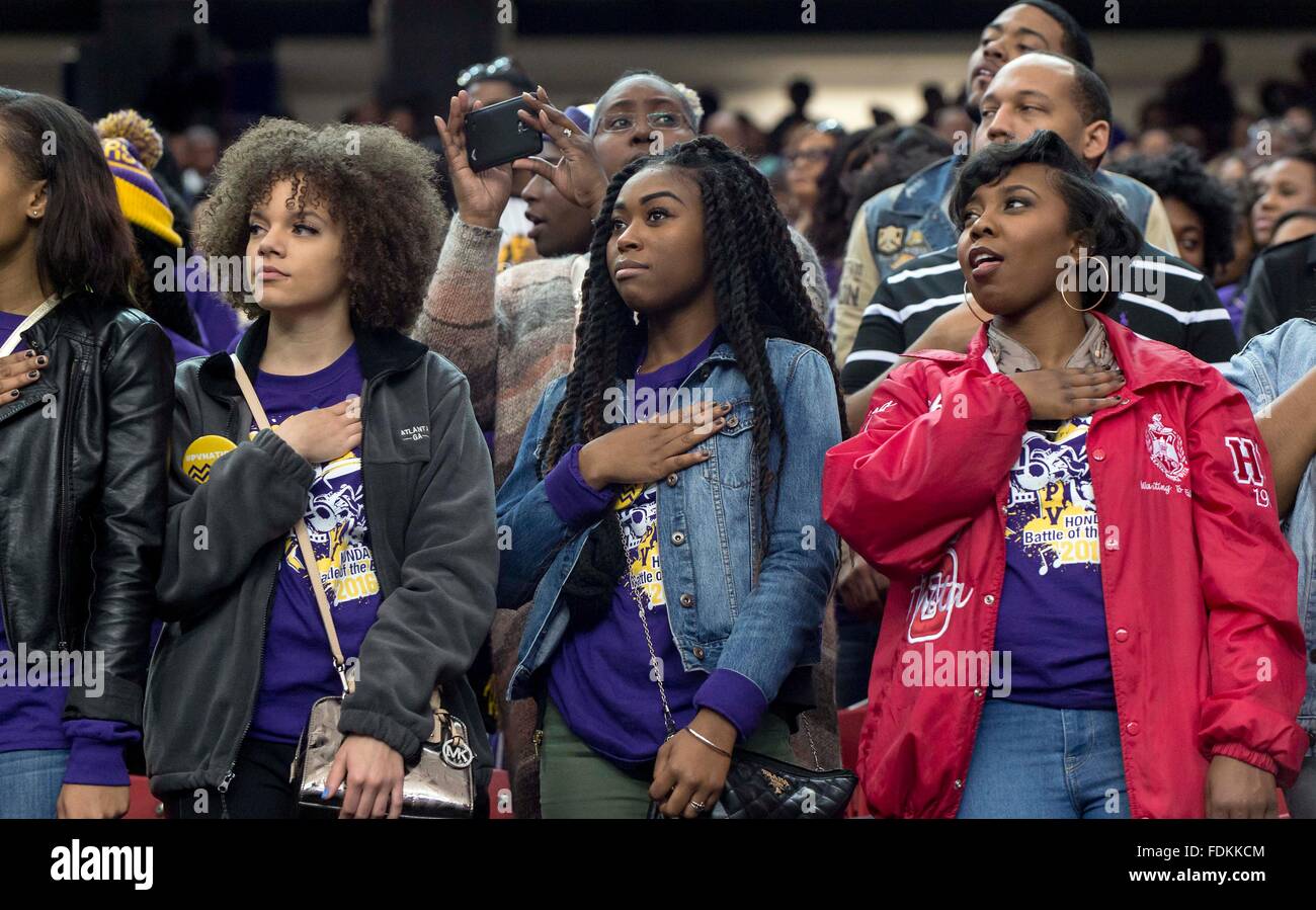 Atlanta, GA, USA. 30th Jan, 2016. People in the audience stand for the ...
