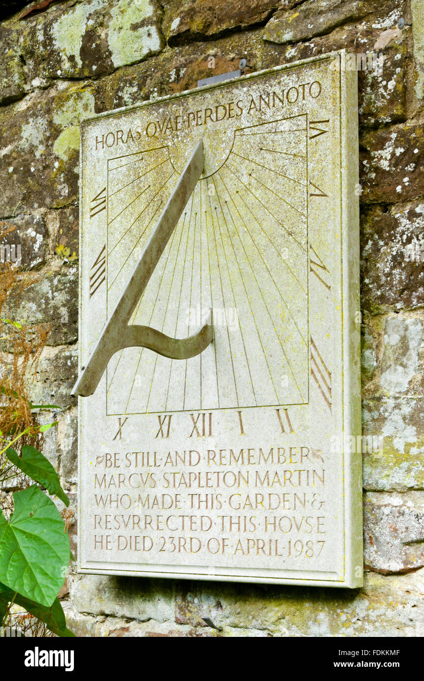 Sundial on the wall of the herb knot garden at The Old Manor, Norbury ...