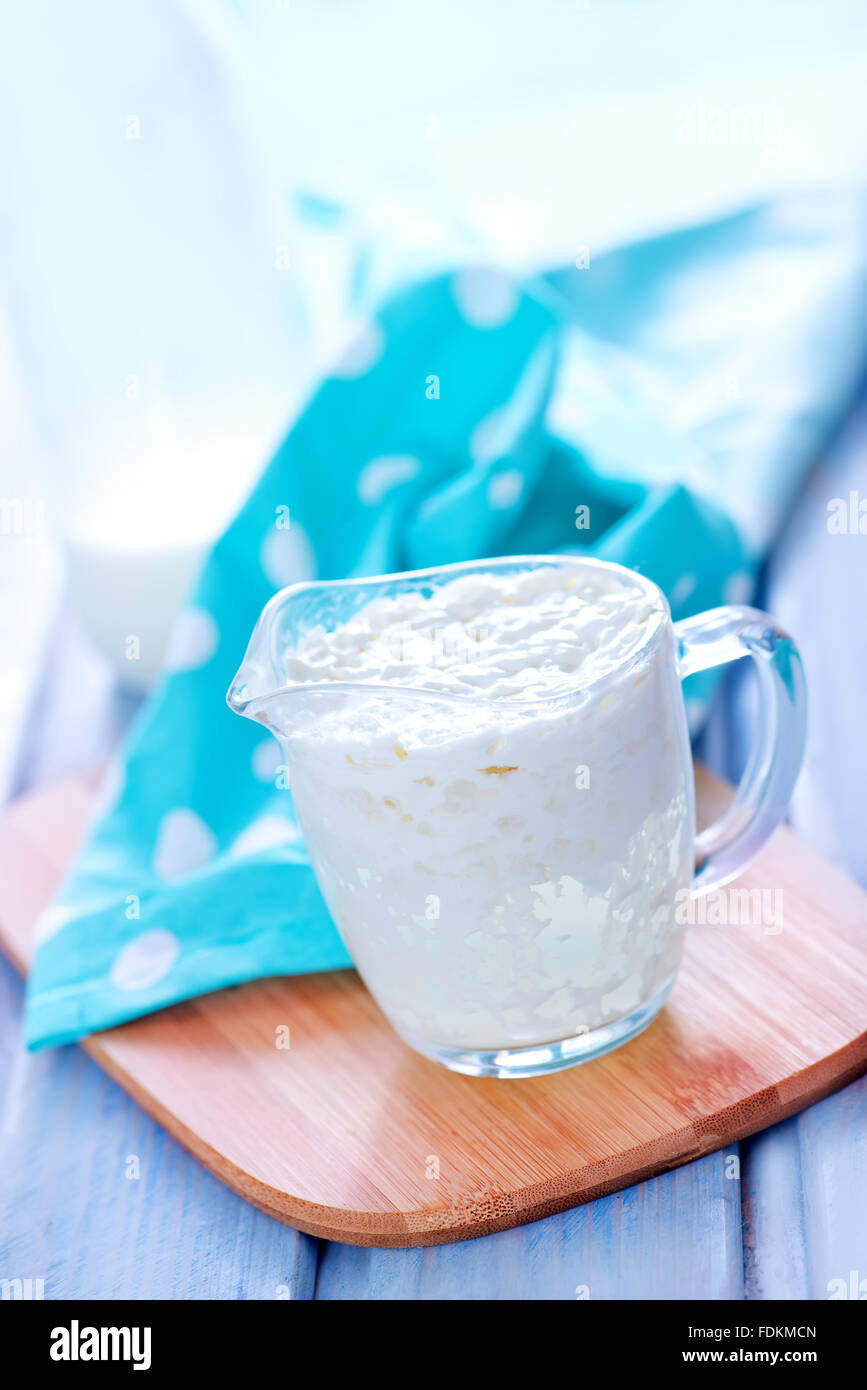 kefir in glass jug and on a table Stock Photo - Alamy