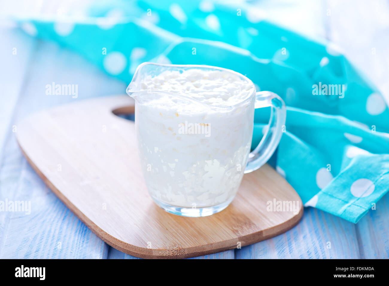 kefir in glass jug and on a table Stock Photo - Alamy