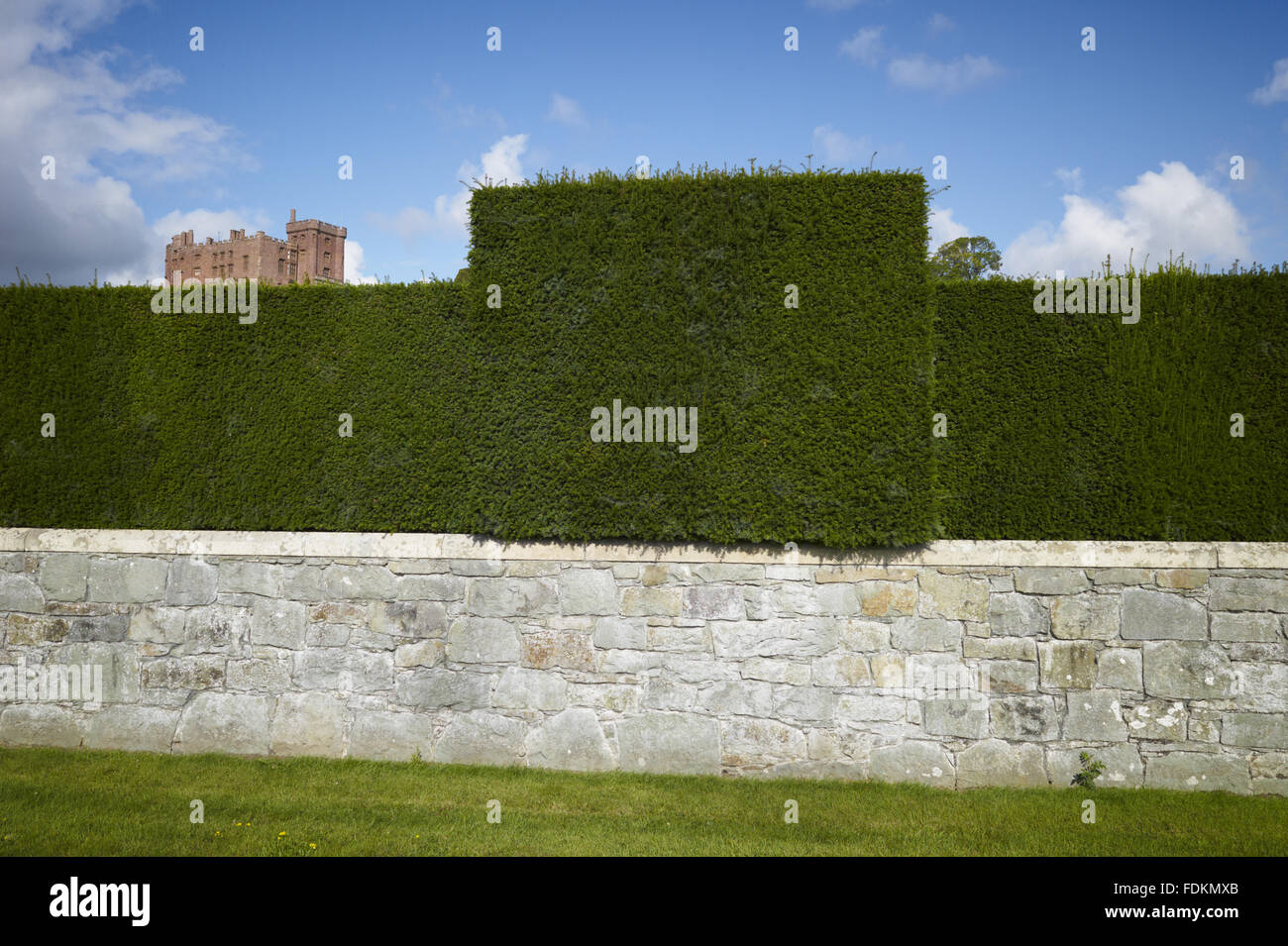Geometric topiary hedge surrounding the Fountain Garden at Powis Castle ...
