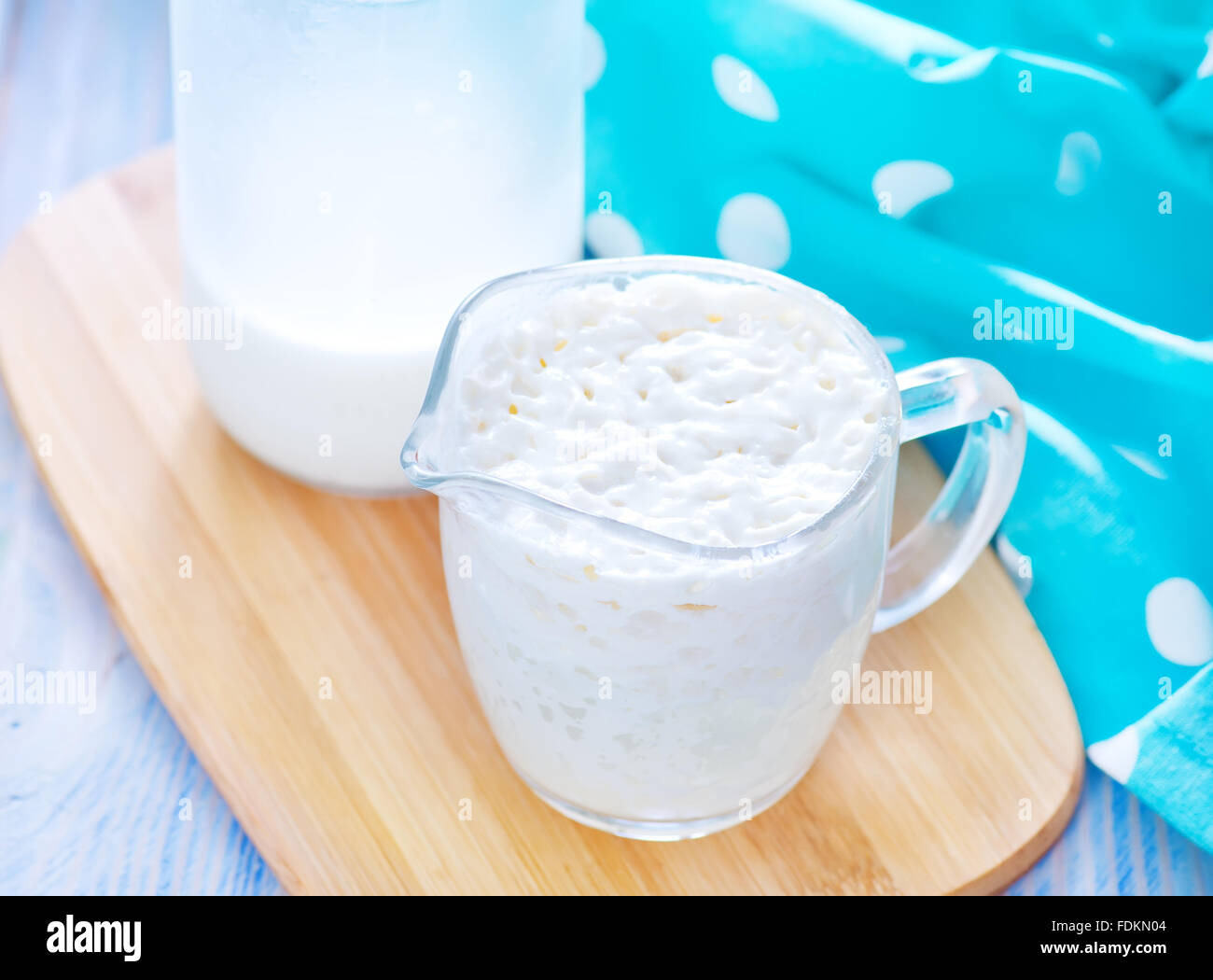 kefir in glass jug and on a table Stock Photo - Alamy