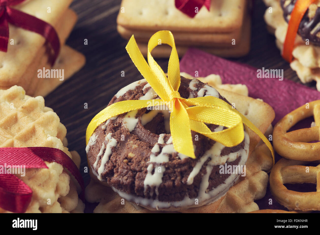Stack of delicious cookies on table tied with ribbon Stock Photo - Alamy