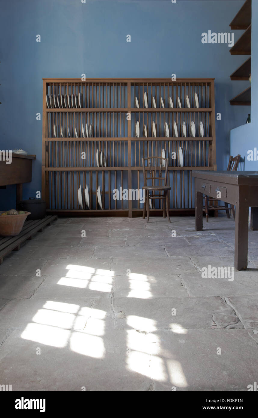 Plate rack in the Scullery at Tredegar House, Newport, South Wales. The ...