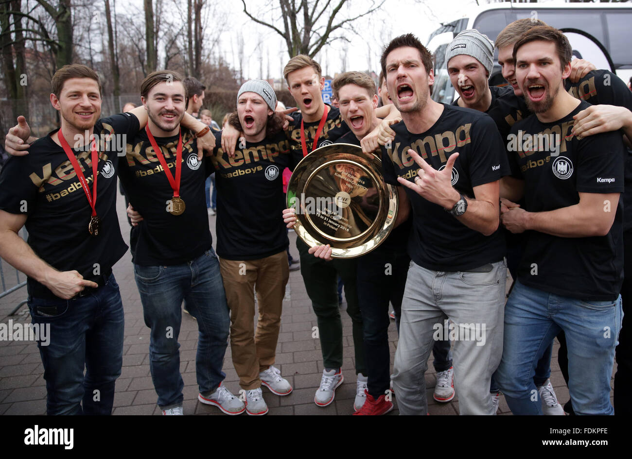 The German Handball national team celebrating with the cup at a fan ...