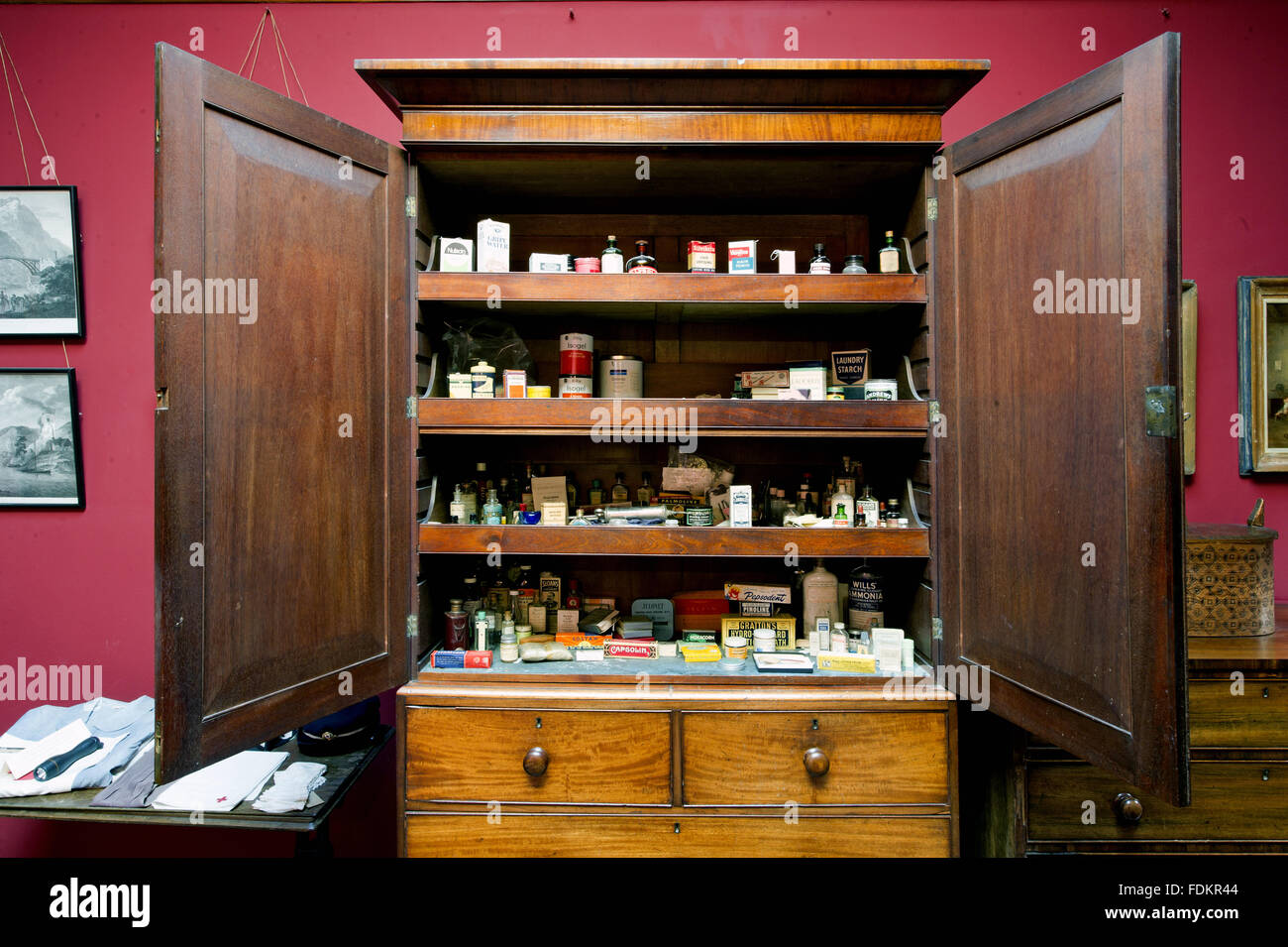 Two door linen press cupboard with arched panels and three sliding ...