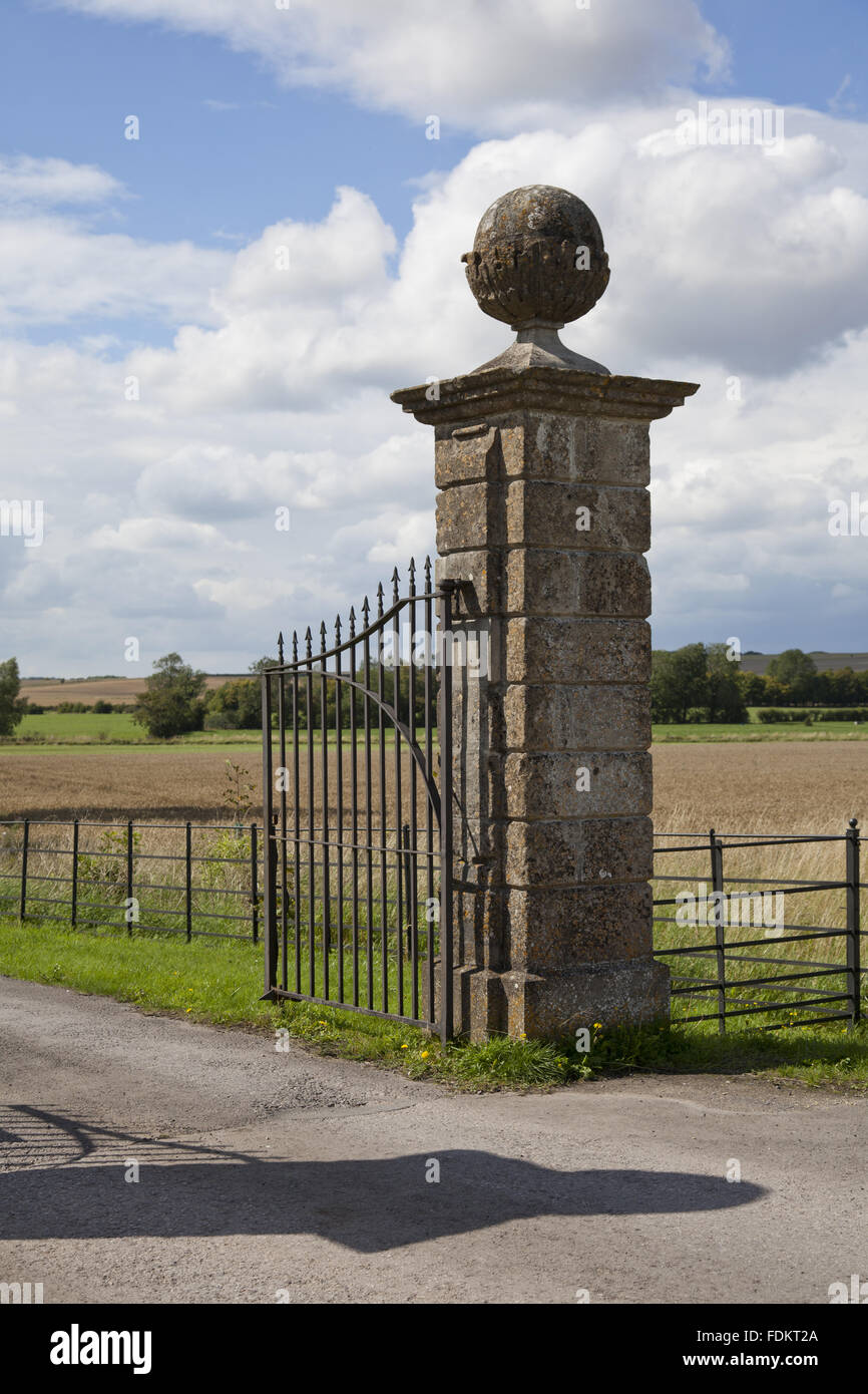 One of the stone gateposts on the Swindon road entrance to Avebury ...