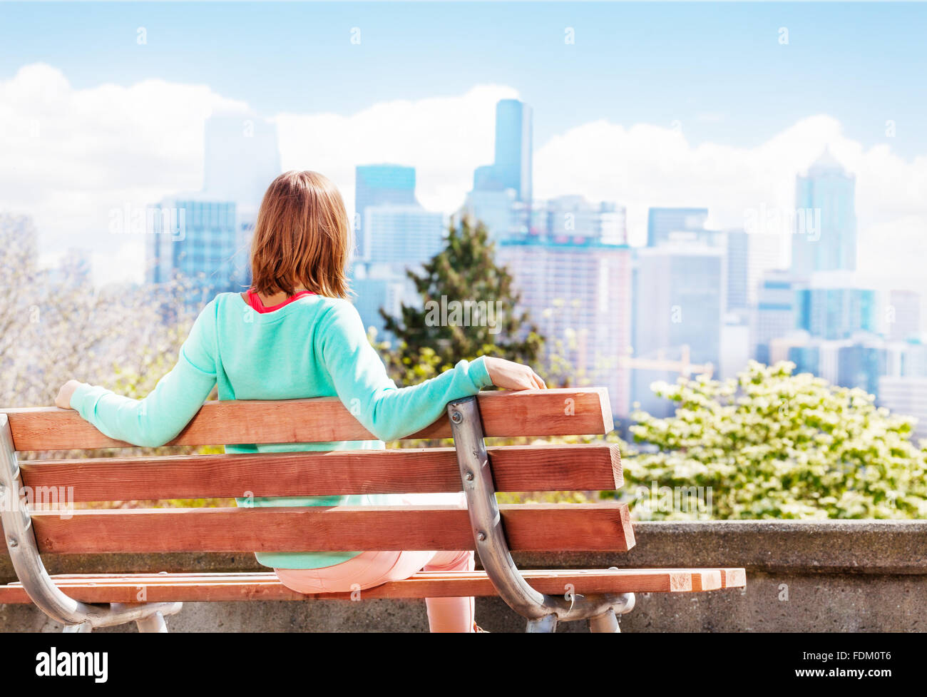 Young woman in Seattle park look at downtown Stock Photo - Alamy