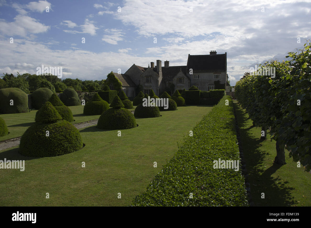 View through the Apostle Garden to Lytes Cary Manor, Somerset Stock ...