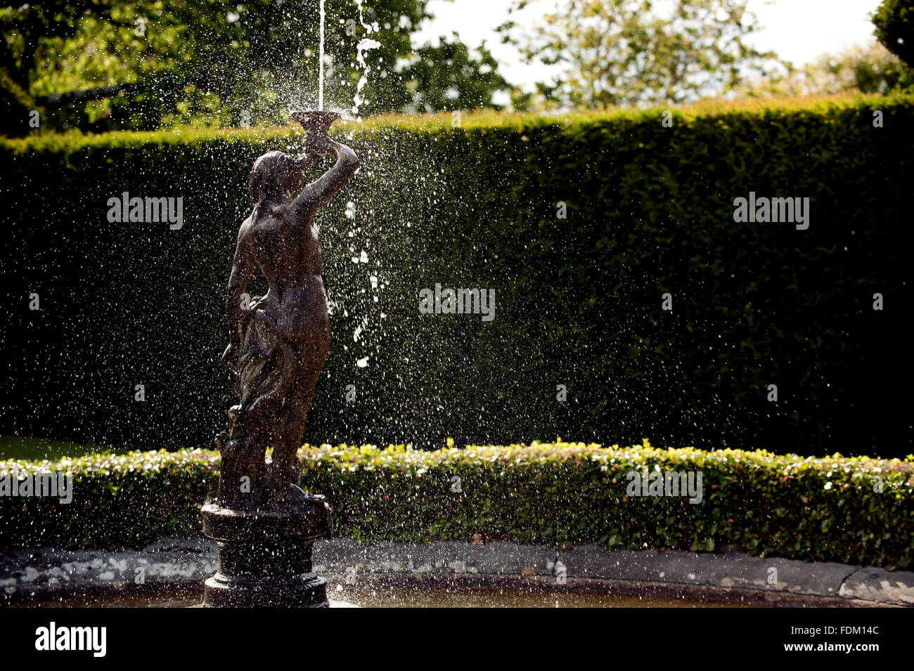 Fountain in the Pond Garden at Lytes Cary Manor, Somerset Stock Photo ...